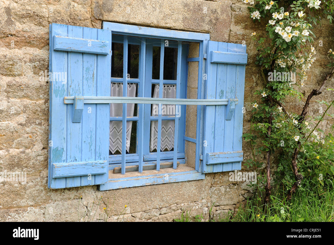 French cottage windows with shutters at the Ecomusee de Saint-Degan in ...