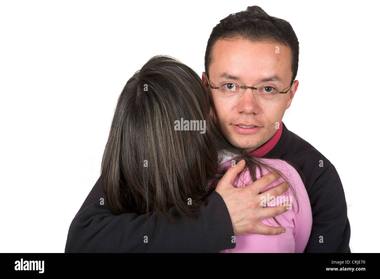 Man hugging dark haired young woman hi-res stock photography and images ...