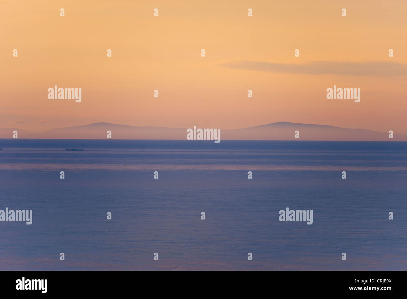 Sunset over Amlwch Anglesey Uk. And the Isle of Man Stock Photo - Alamy