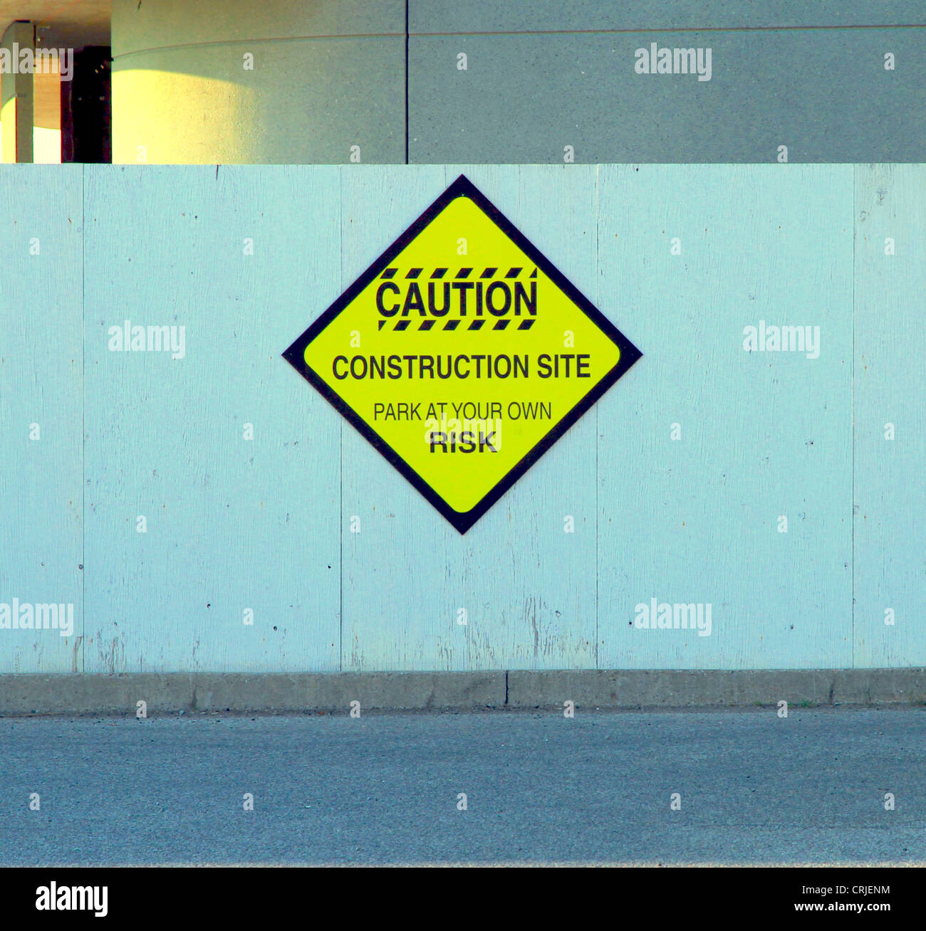 A caution sign outside a restricted area Stock Photo - Alamy