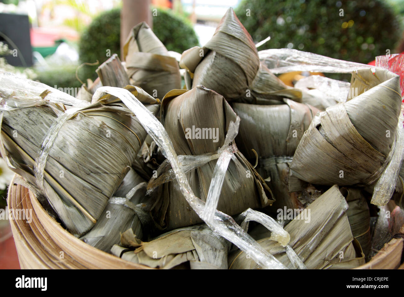 Chinese rice dumplings wrapped in reed leaves Stock Photo - Alamy