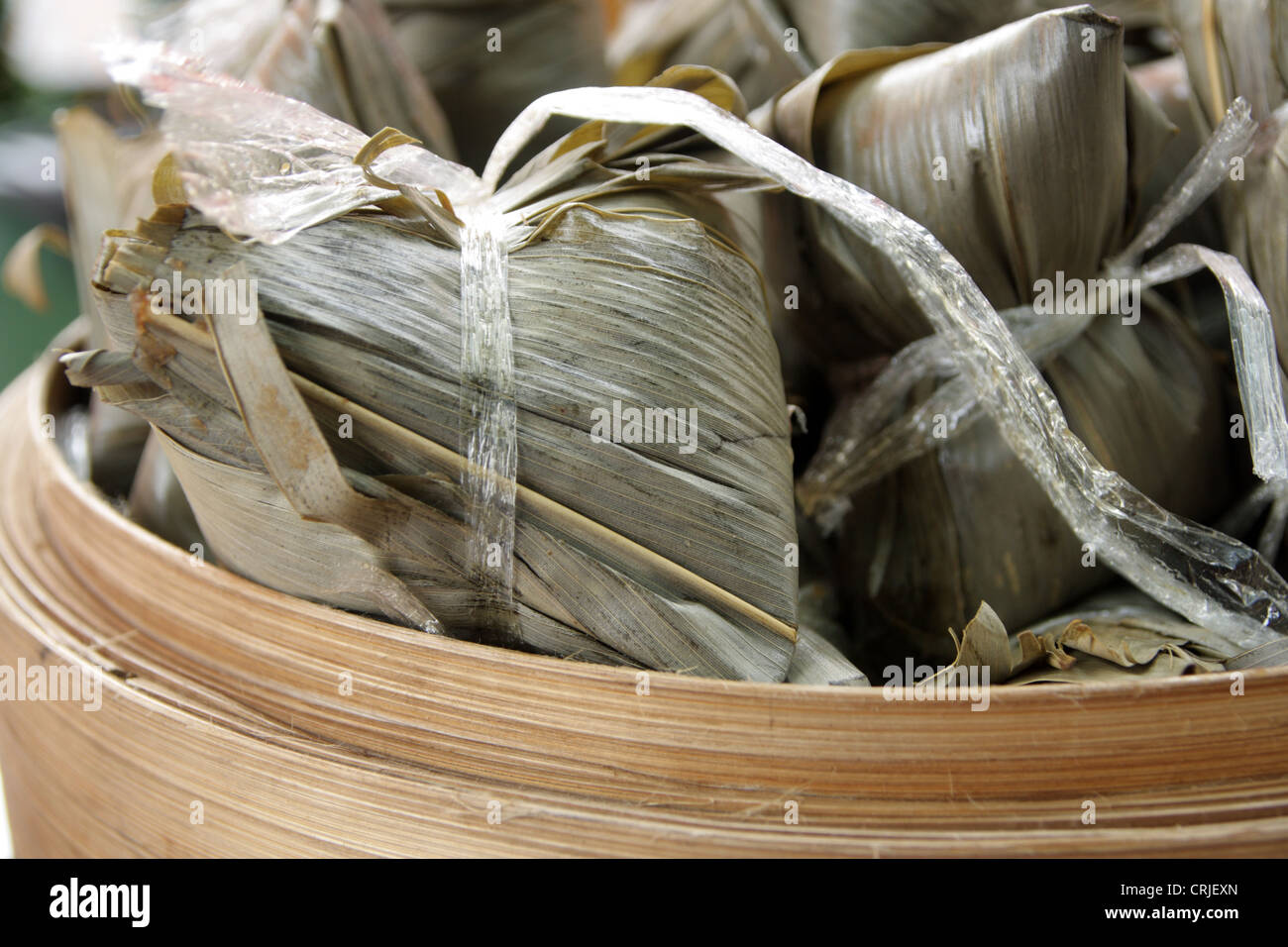 Chinese rice dumplings wrapped in reed leaves Stock Photo - Alamy