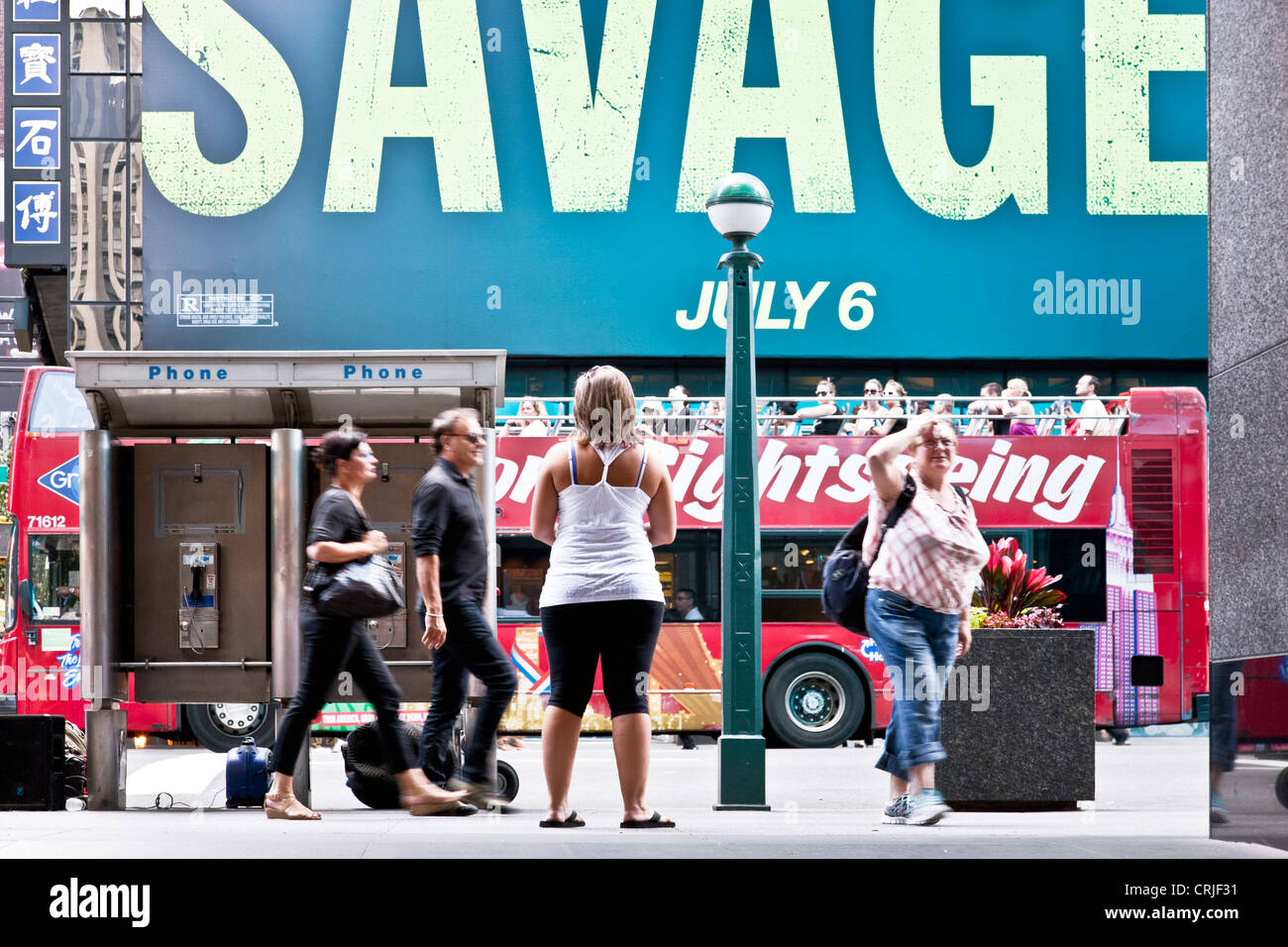 onlooker pauses to survey kinetic flurry of movement & bold advertising ...