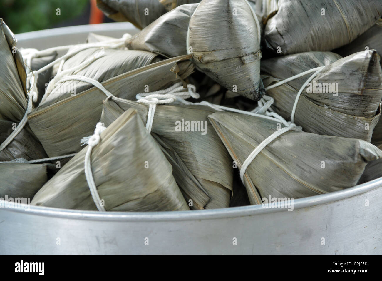 Chinese rice dumplings wrapped in reed leaves Stock Photo - Alamy