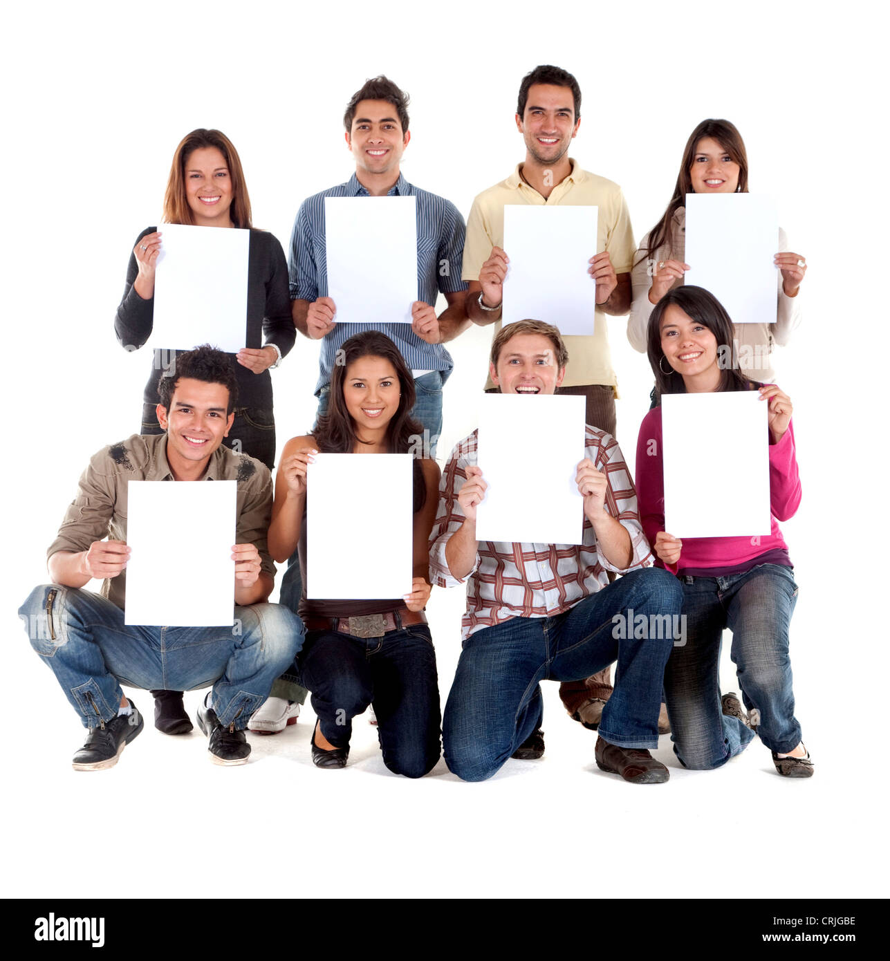 group of young people in casual clothing holding empty white cardboards ...