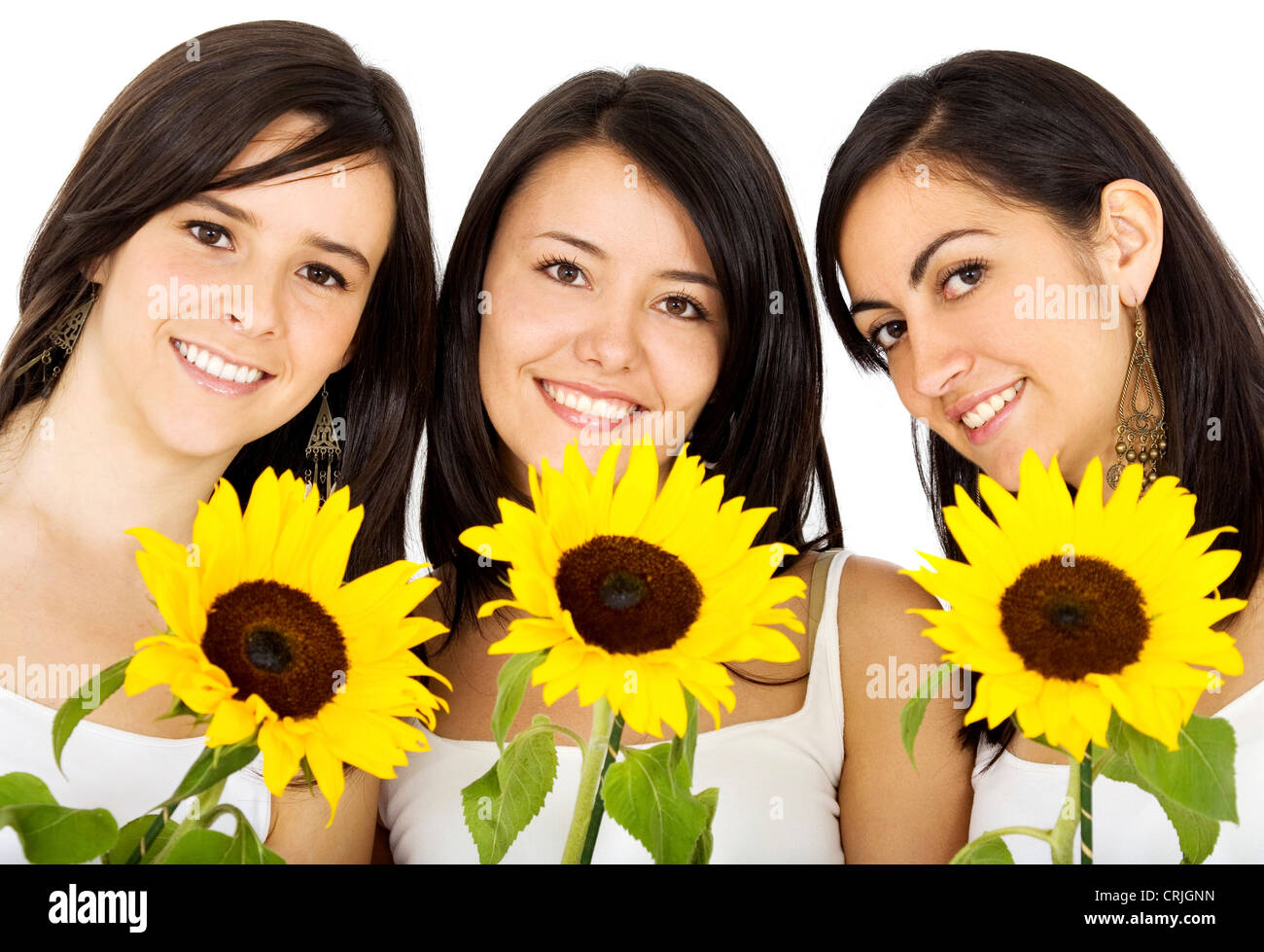 three smiling girls with three sun flowers Stock Photo - Alamy