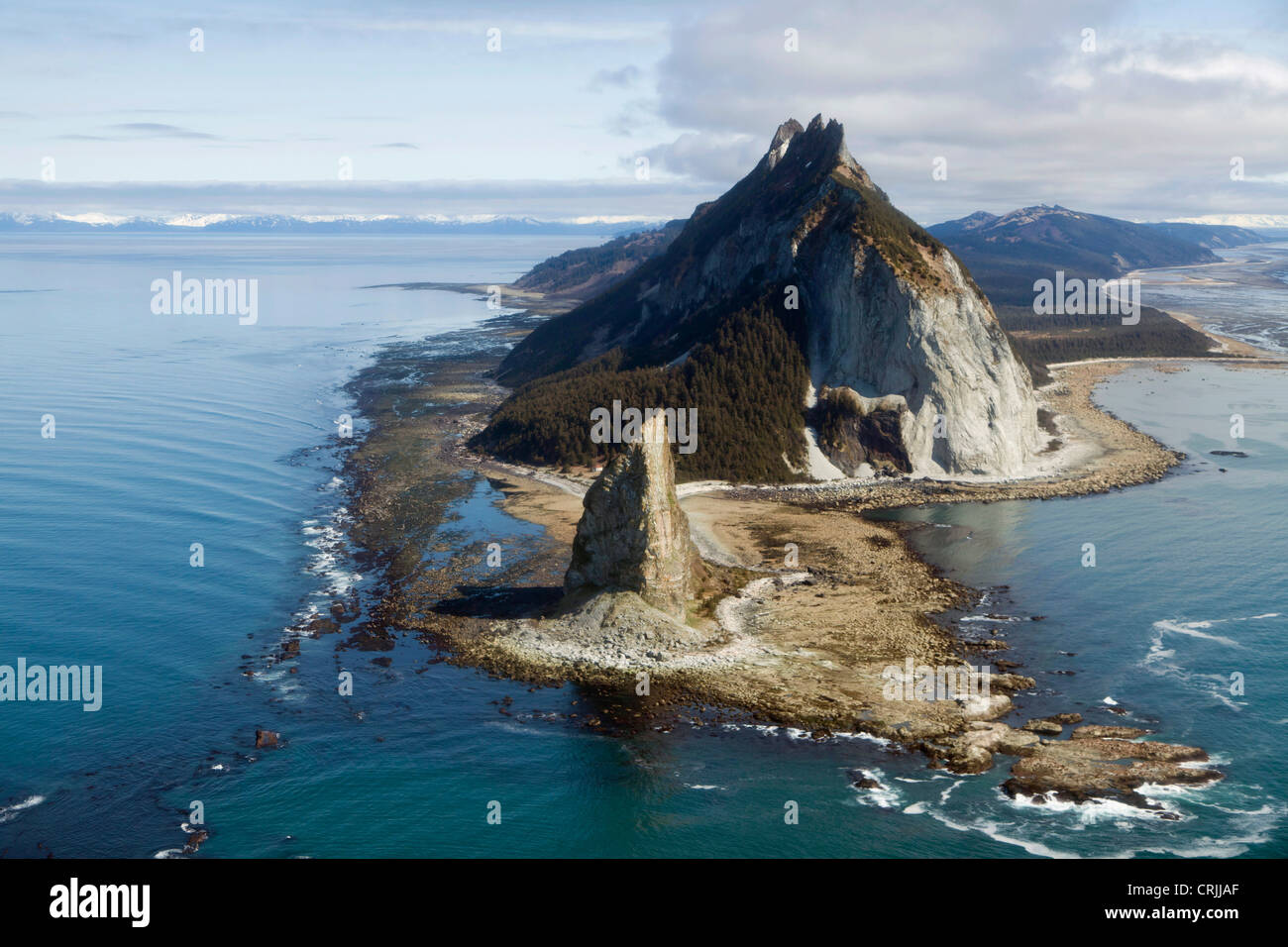 Gulf of Alaska, the lighthouse and rock pinnacle at Cape St. Elias on ...