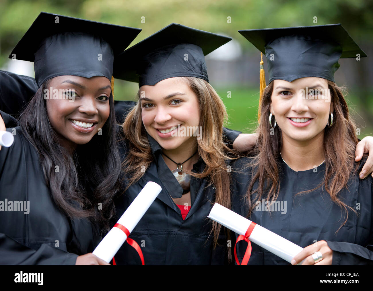 happy students with doctoral cap an diploma Stock Photo - Alamy