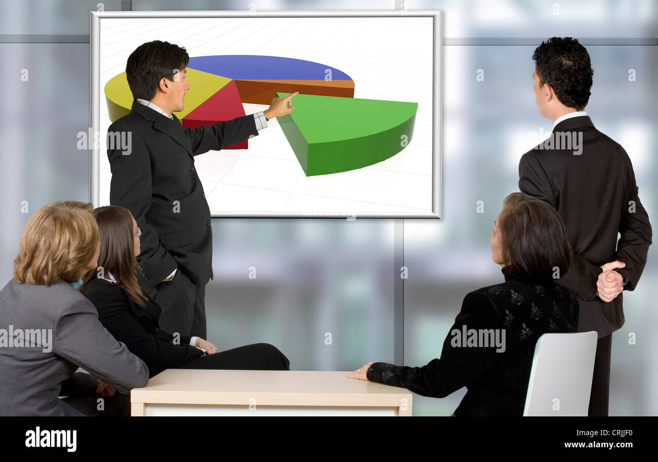 young businessman explaining a pie chart during a business meeting ...