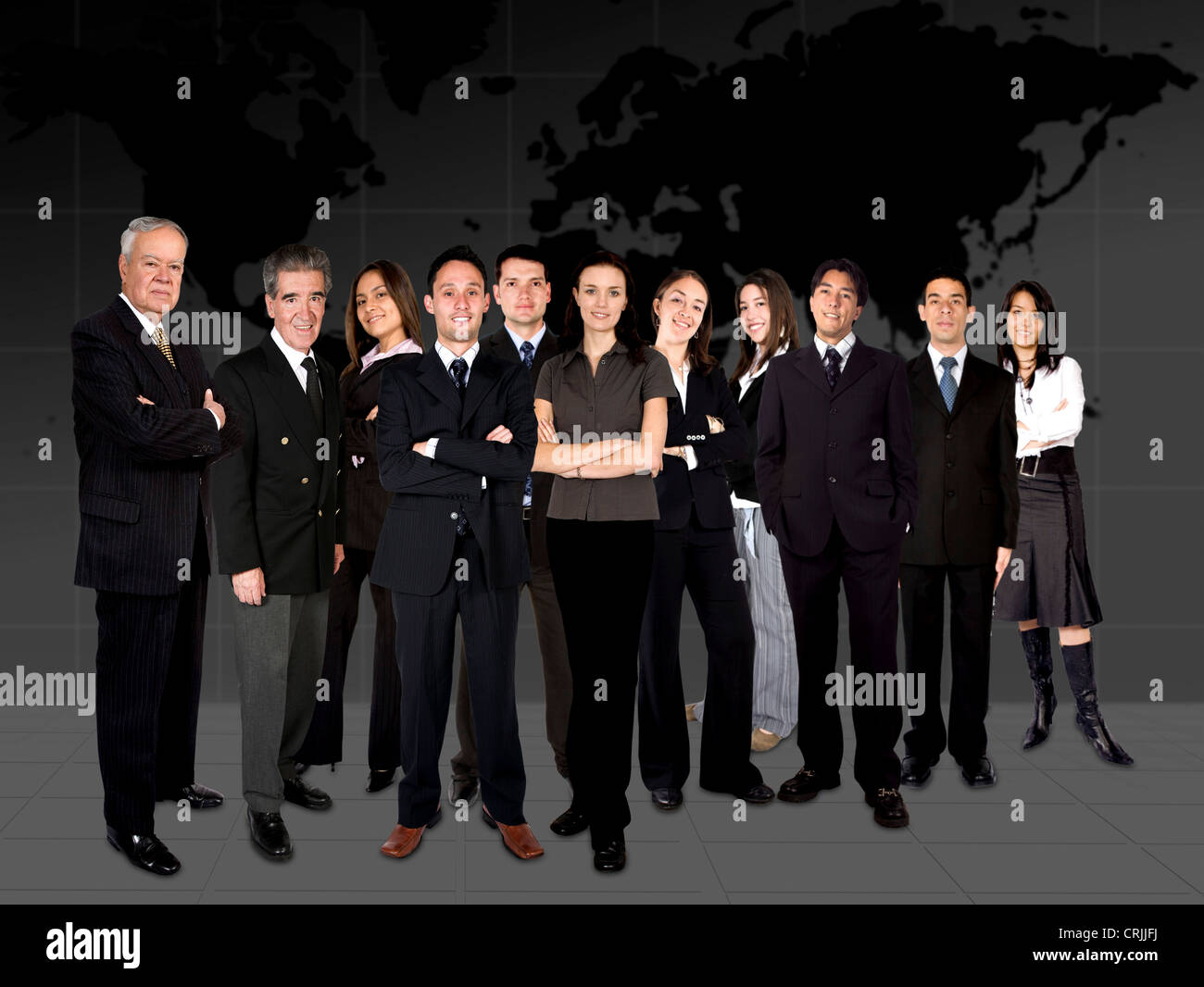 company staff standing in front of a world map Stock Photo - Alamy