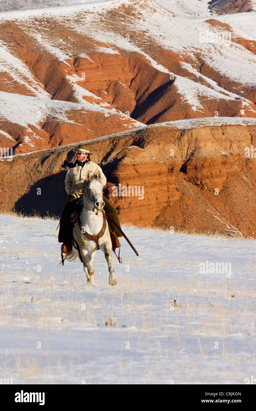 North America; USA; Wyoming; Shell; Cowboy riding Horse through the ...