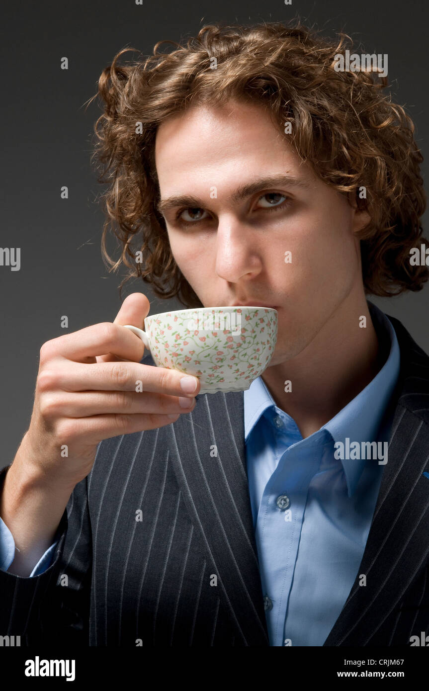 Man with a cup of coffee Stock Photo - Alamy