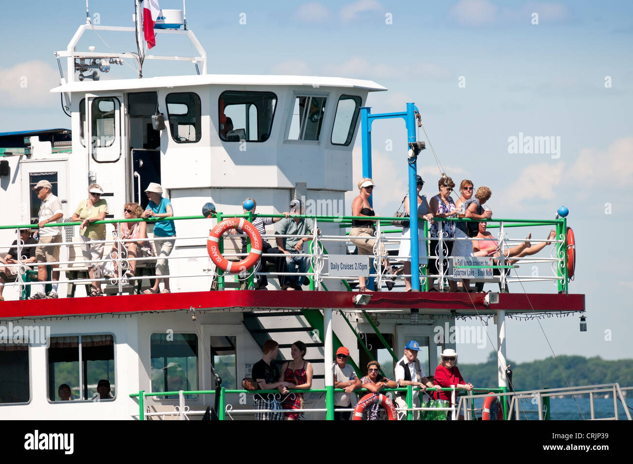 Passengers on a cruise boat Stock Photo - Alamy