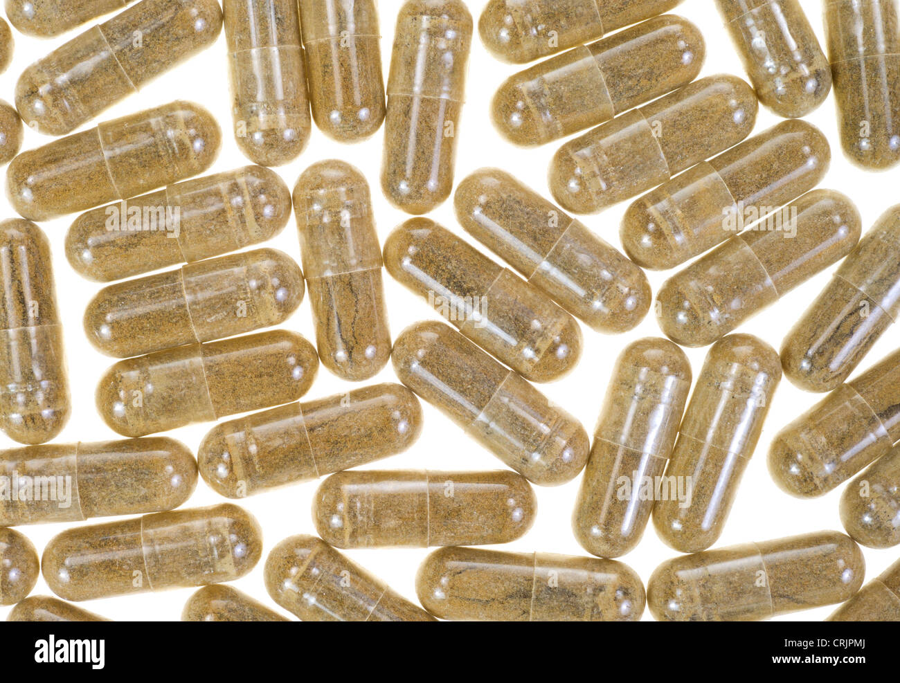 Layer of green tea extract capsules Stock Photo - Alamy
