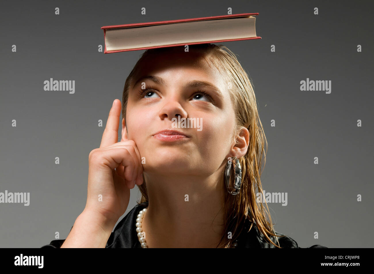 Balancing the book hi-res stock photography and images - Alamy