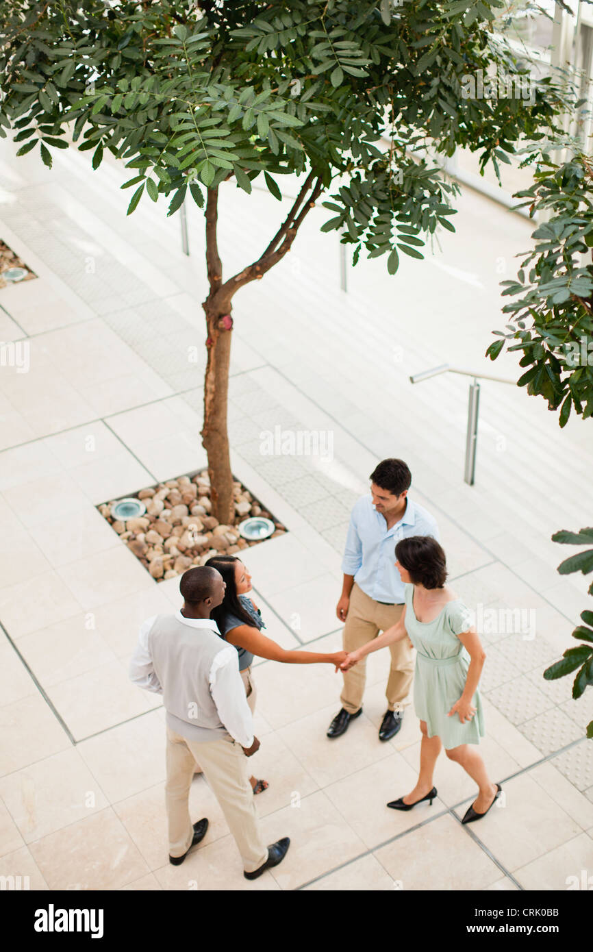 Businessman shaking tree hi-res stock photography and images - Alamy