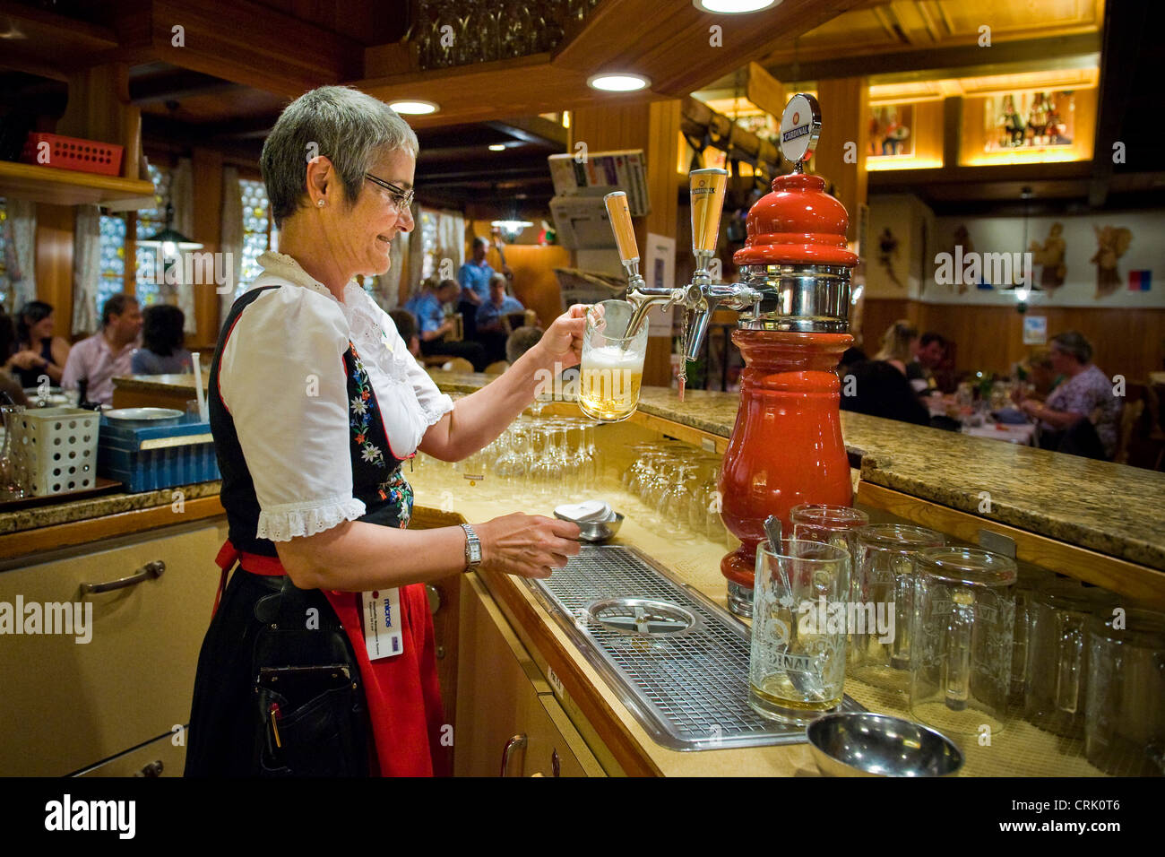 Barmaid pulling a pint hi-res stock photography and images - Alamy
