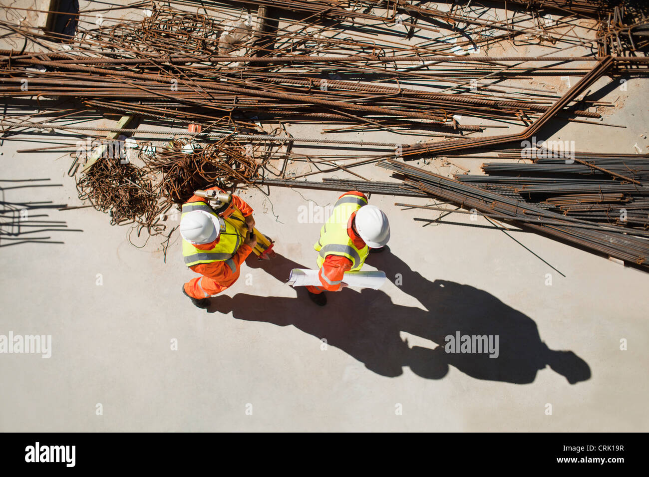 Worker carrying rebar hi-res stock photography and images - Alamy