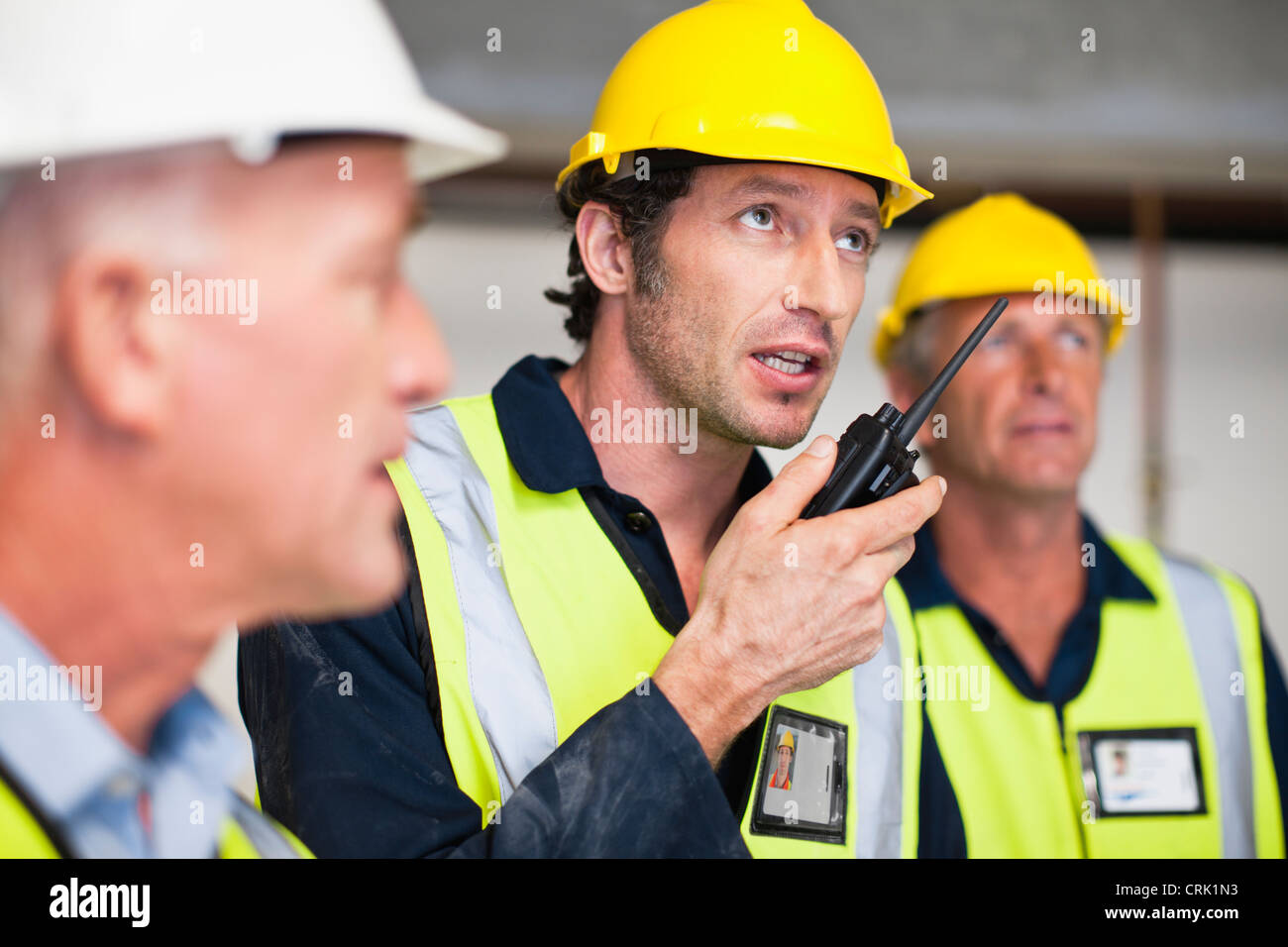 Engineer talking colleague using walkie hi-res stock photography and ...
