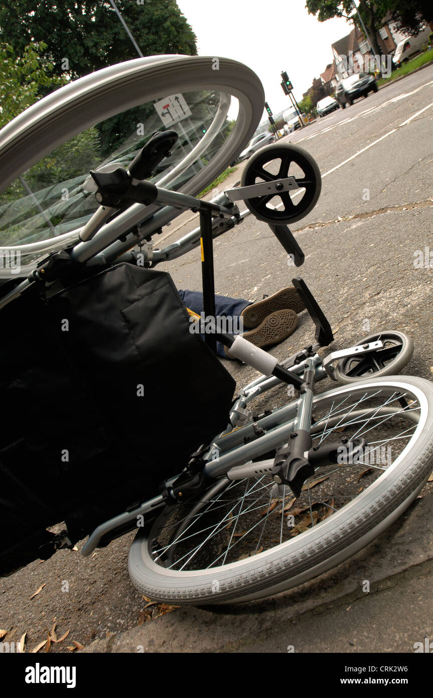 Fall falling wheelchair disabled hi-res stock photography and images ...