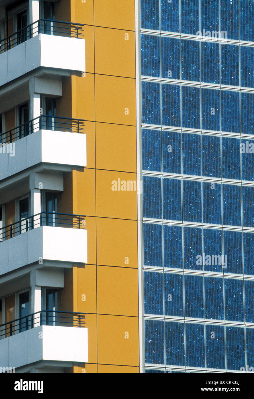 Facade of a renovated high-rise building with solar panel Stock Photo ...