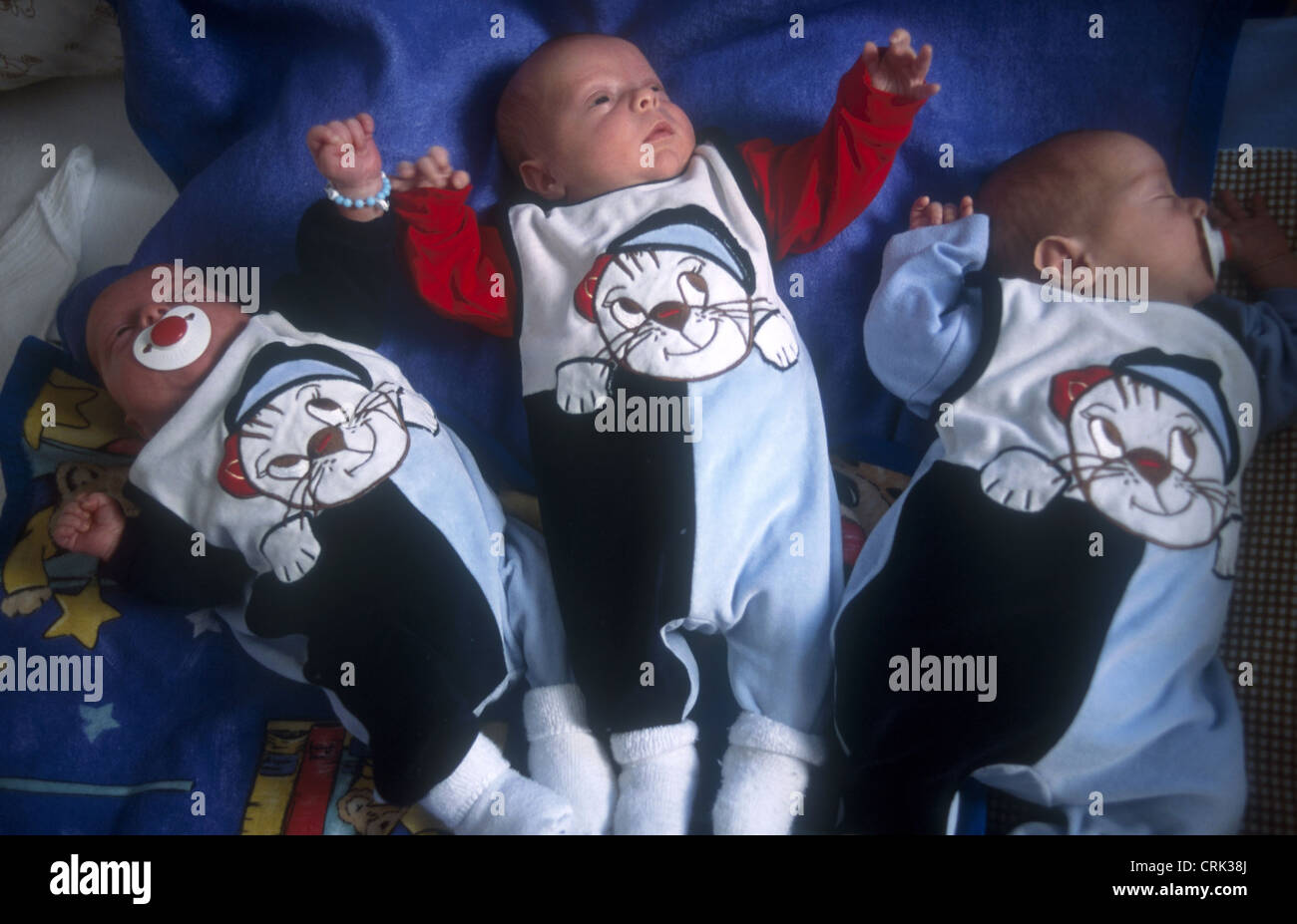 Identical triplets hi-res stock photography and images - Alamy