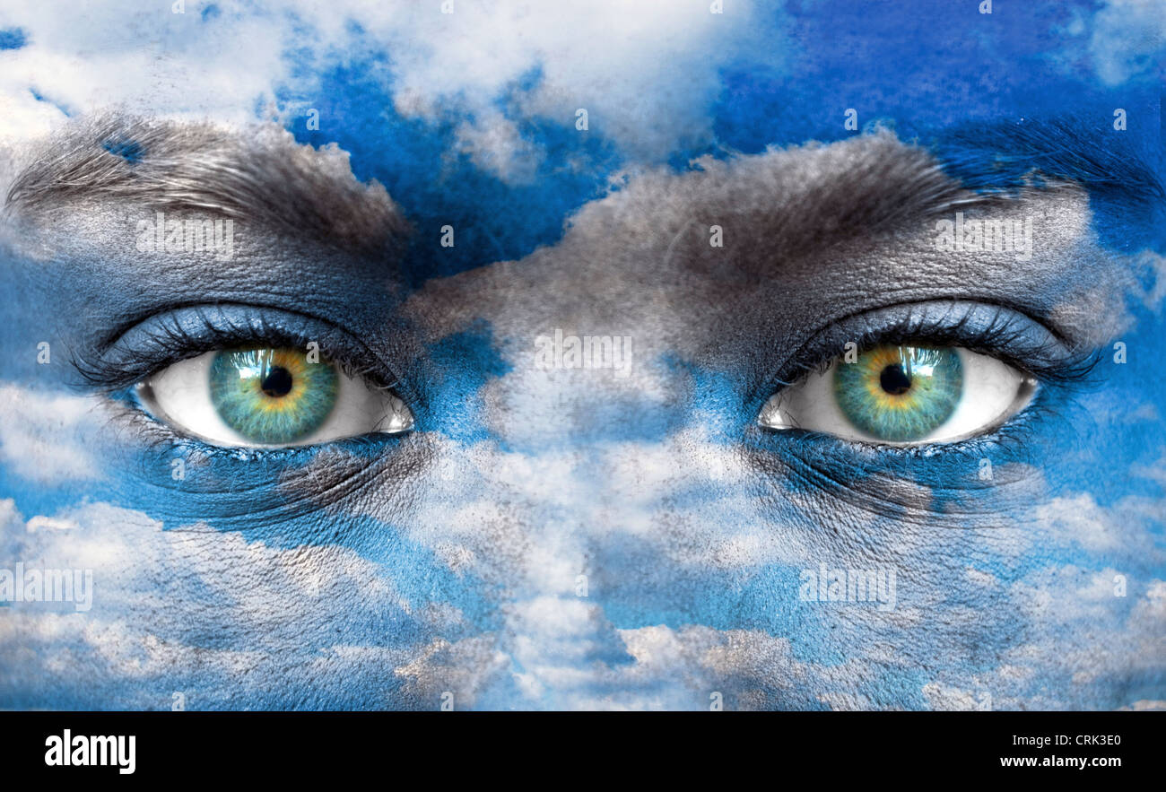 Blue human eyes with sky pattern Stock Photo - Alamy