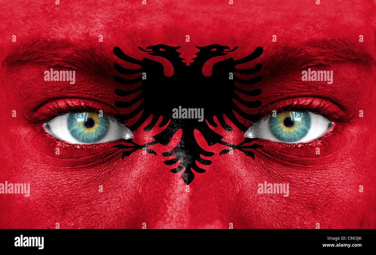 Human face painted with flag of Albania Stock Photo - Alamy