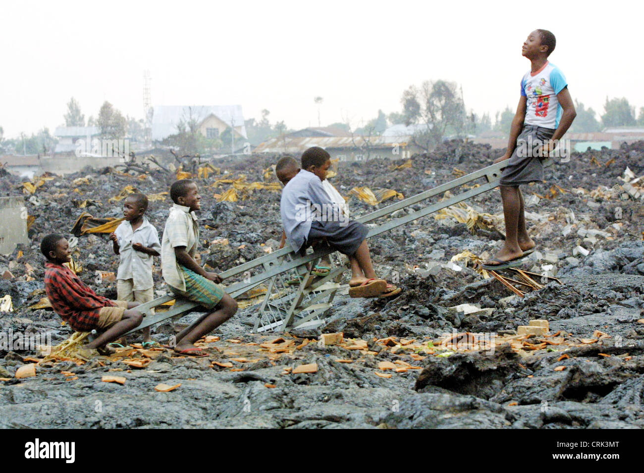 Children playing after the volcanic eruption in Goma Stock Photo - Alamy