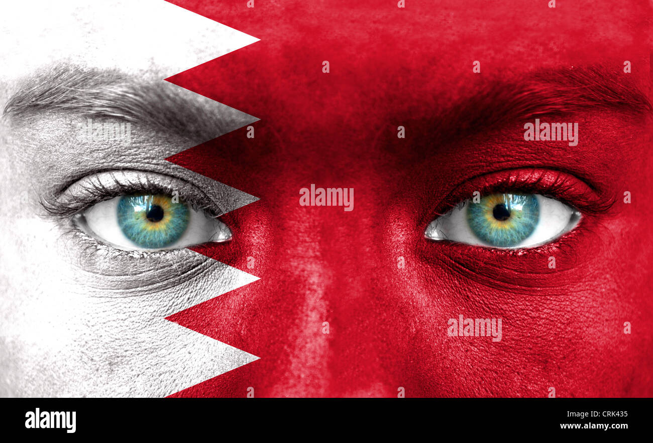 Human face painted with flag of Bahrain Stock Photo - Alamy