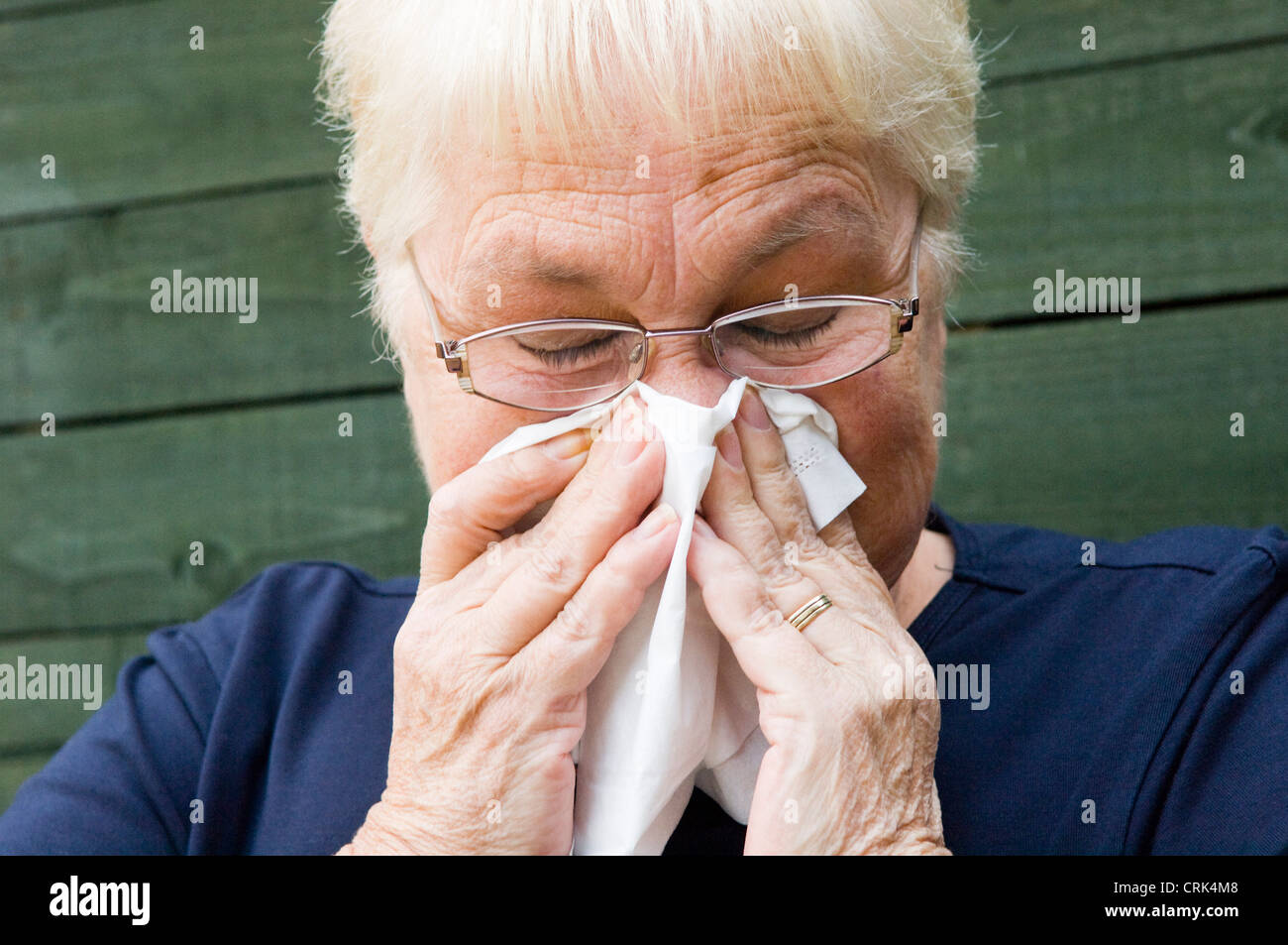 elderly lady crying in her garden Stock Photo - Alamy