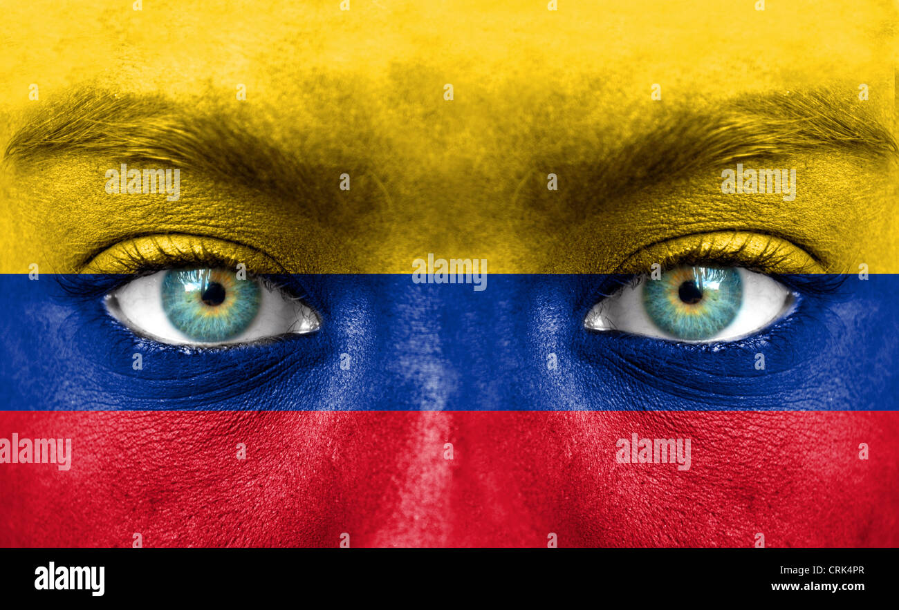 Human face painted with flag of Colombia Stock Photo - Alamy