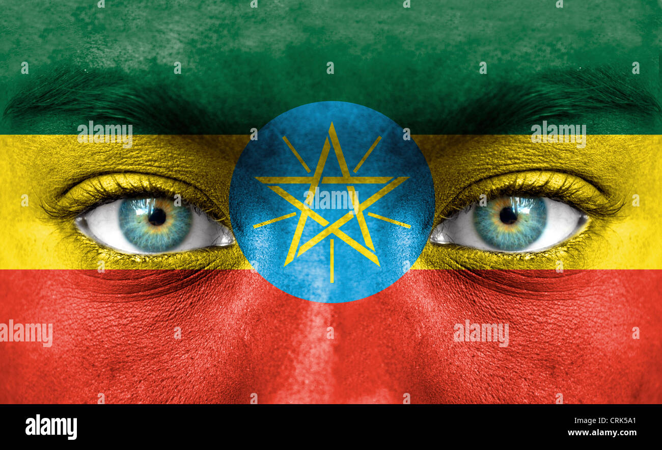 Human face painted with flag of Ethiopia Stock Photo - Alamy
