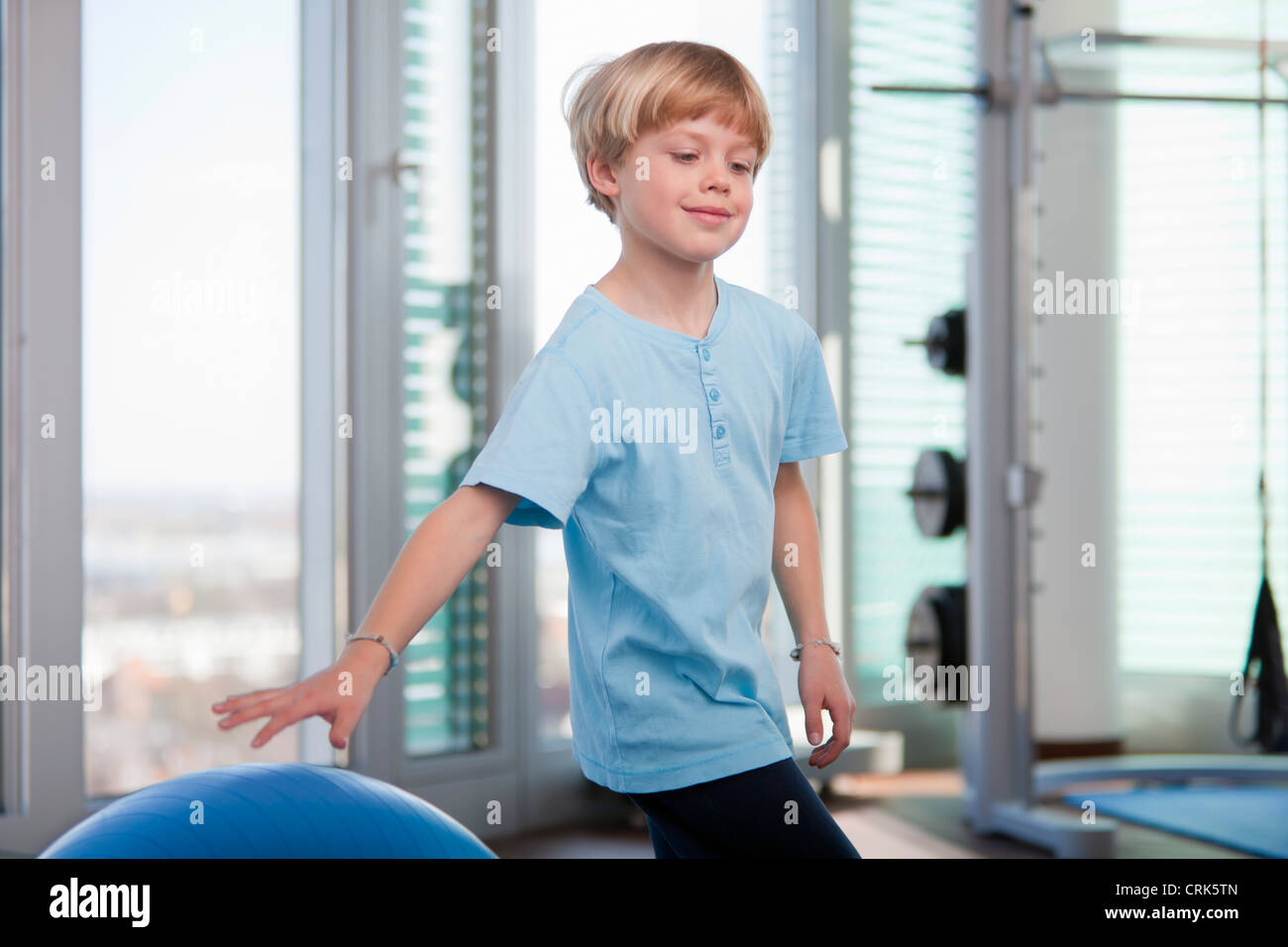 Child exercising gym inside hi-res stock photography and images - Alamy