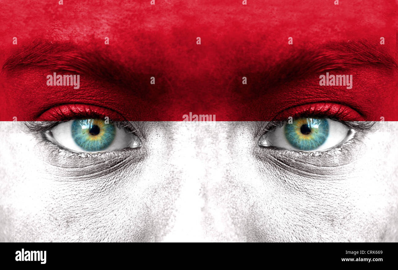 Human face painted with flag of Indonesia Stock Photo - Alamy