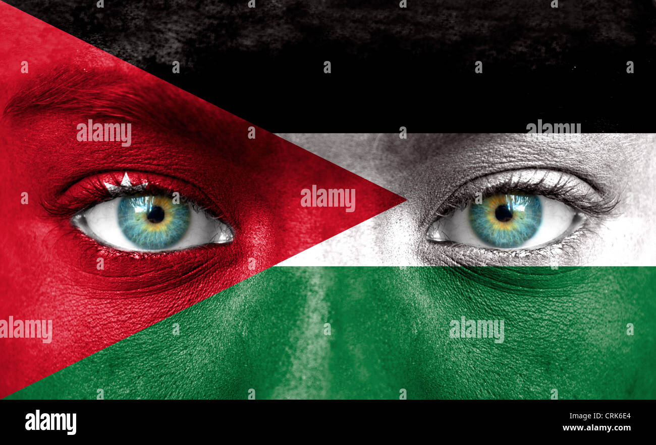 Human face painted with flag of Jordan Stock Photo - Alamy