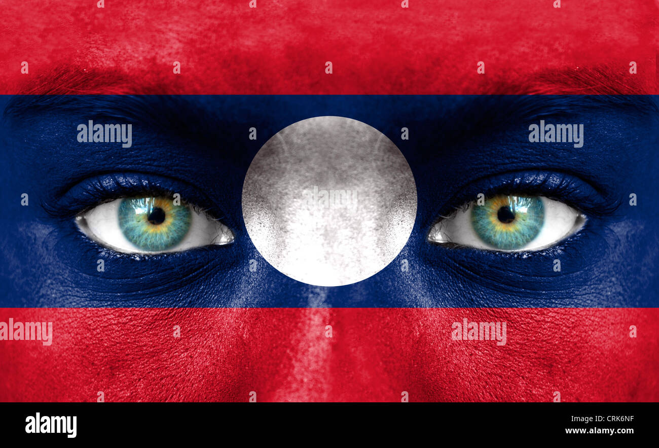 Human face painted with flag of Laos Stock Photo - Alamy
