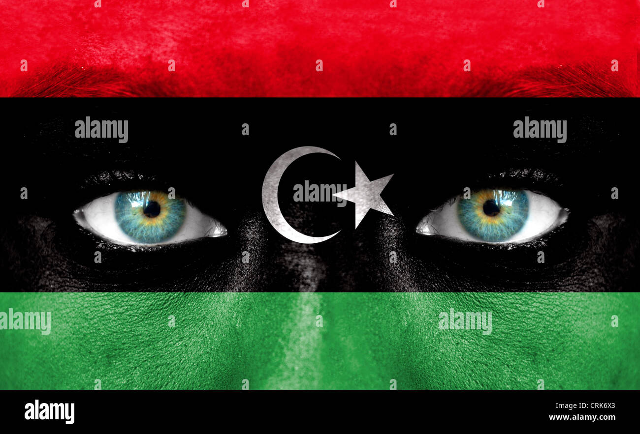 Human face painted with flag of Libya Stock Photo - Alamy