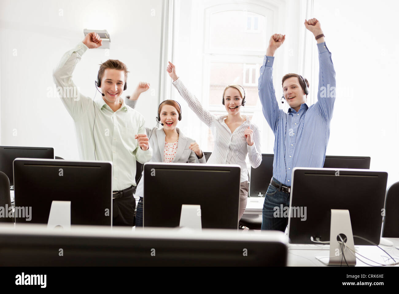Business people cheering camera hi-res stock photography and images - Alamy