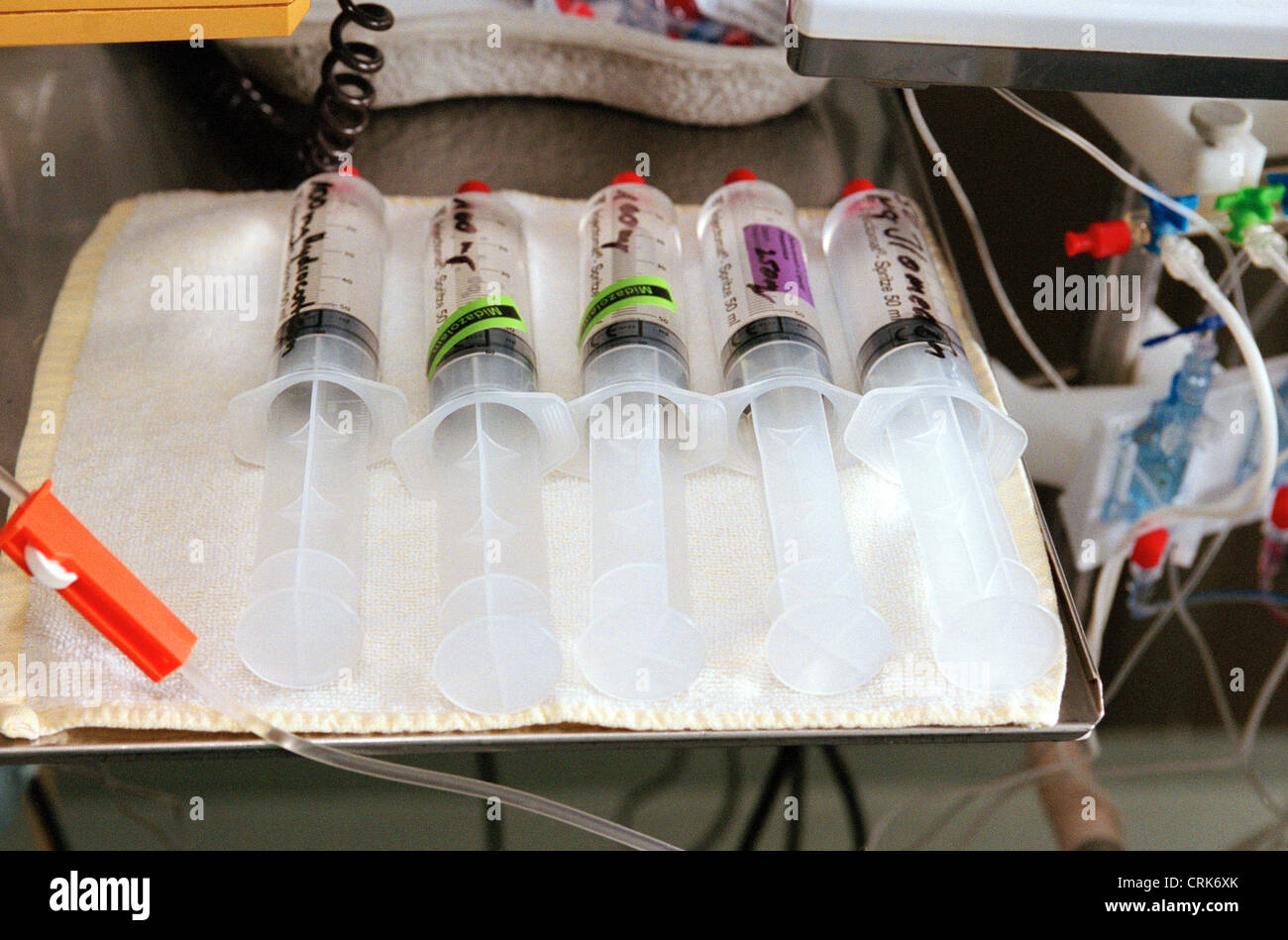 Disposable syringes with medication for pain management in an intensive ...