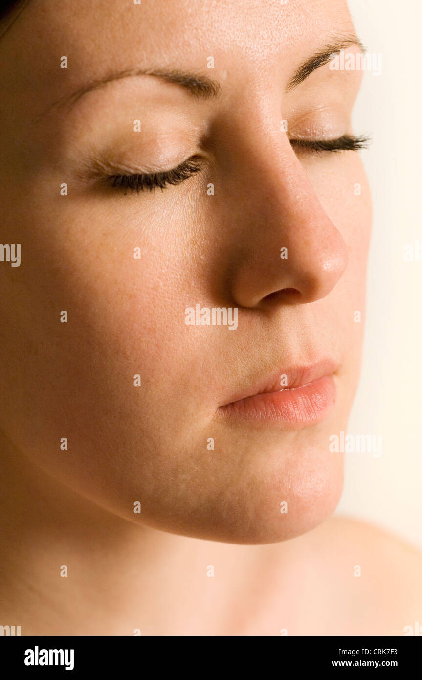 Womans face closed eyes tired hi-res stock photography and images - Alamy