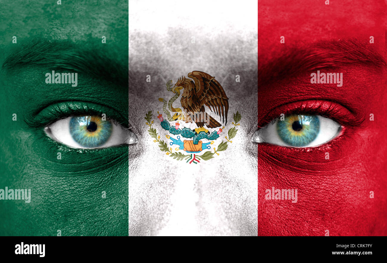 Human face painted with flag of Mexico Stock Photo - Alamy