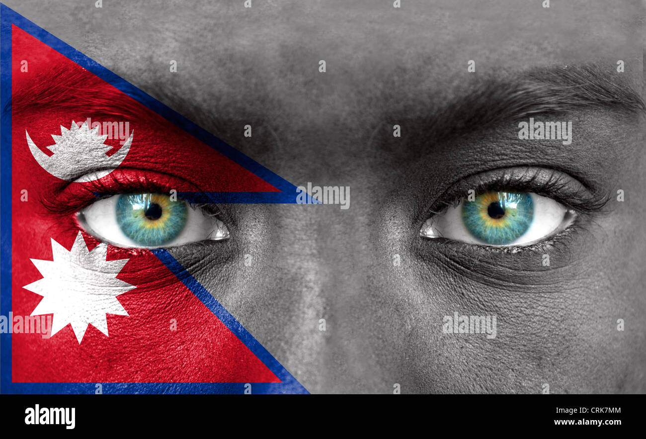 Human face painted with flag of Nepal Stock Photo - Alamy
