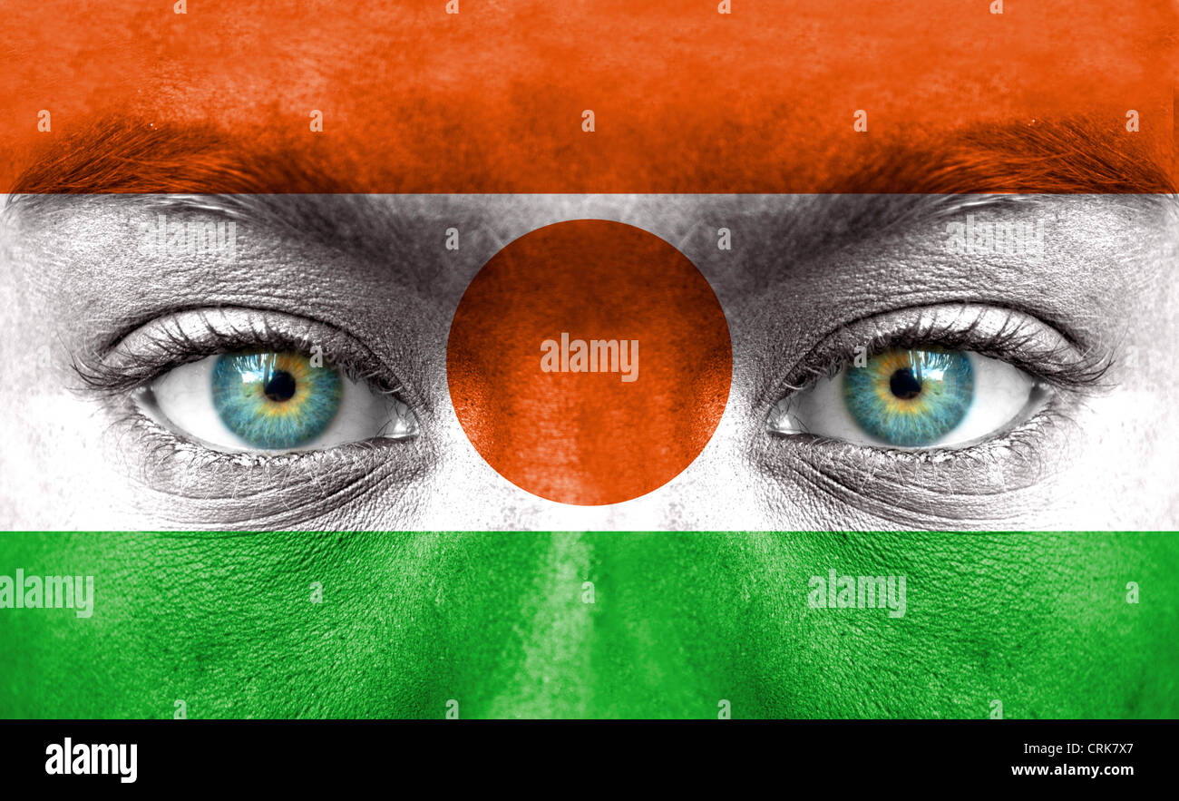 Human face painted with flag of Niger Stock Photo - Alamy
