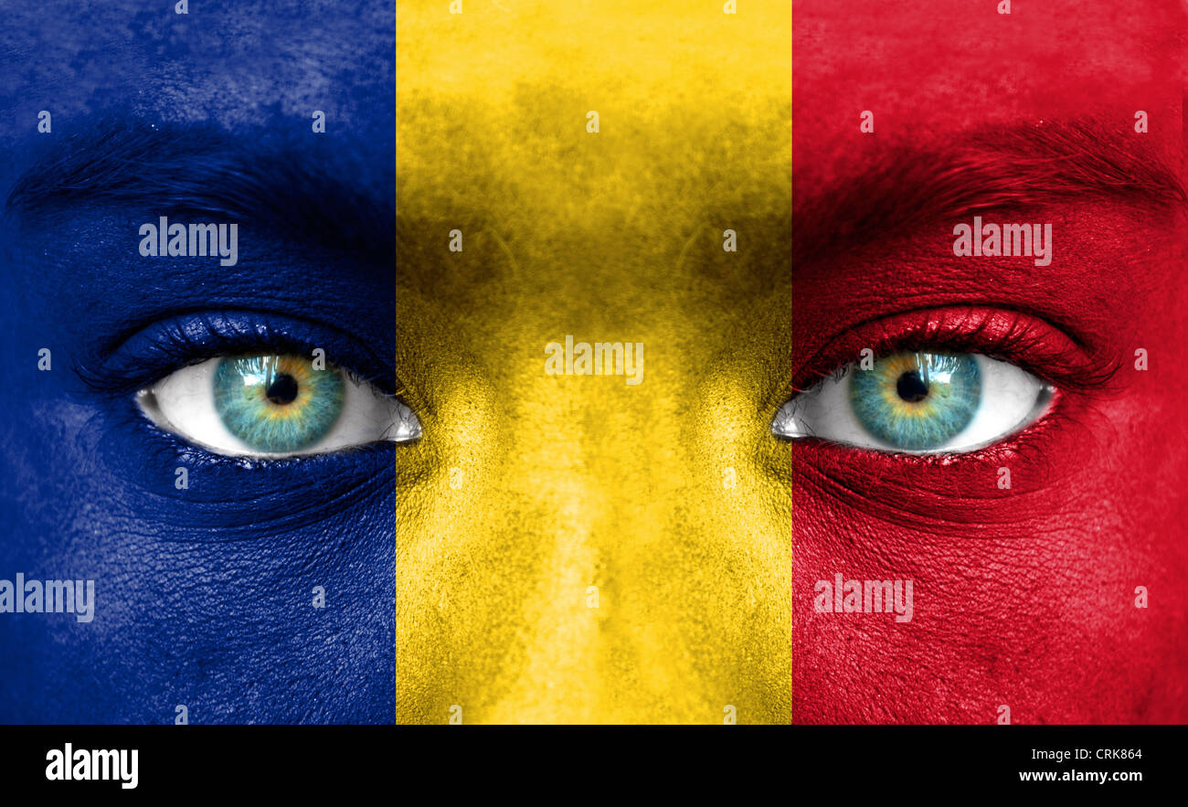 Human face painted with flag of Romania Stock Photo - Alamy