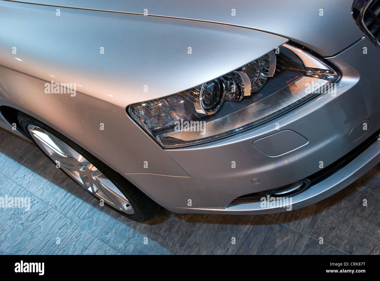 Front lights of a brand new luxury car Stock Photo - Alamy