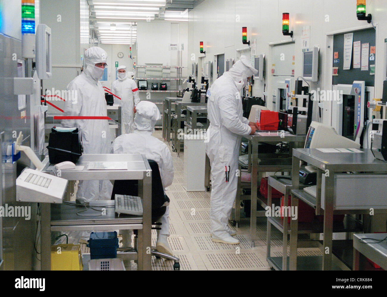 Employees in protective suit cleanroom at Infineon Stock Photo - Alamy