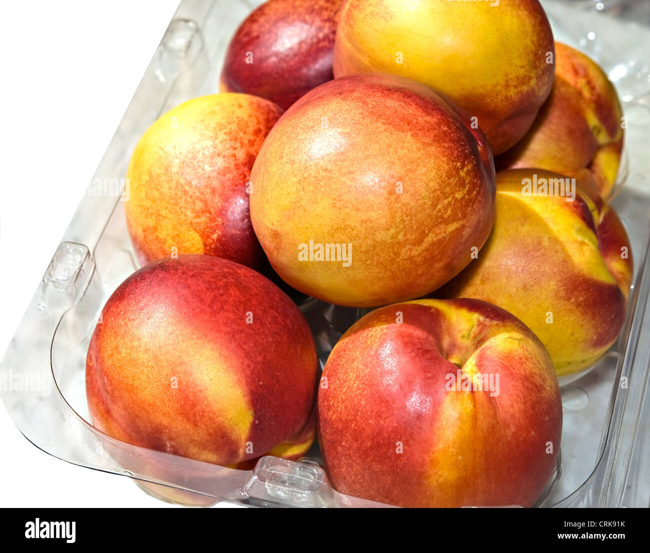 A group of fresh nectarines in a container Stock Photo - Alamy