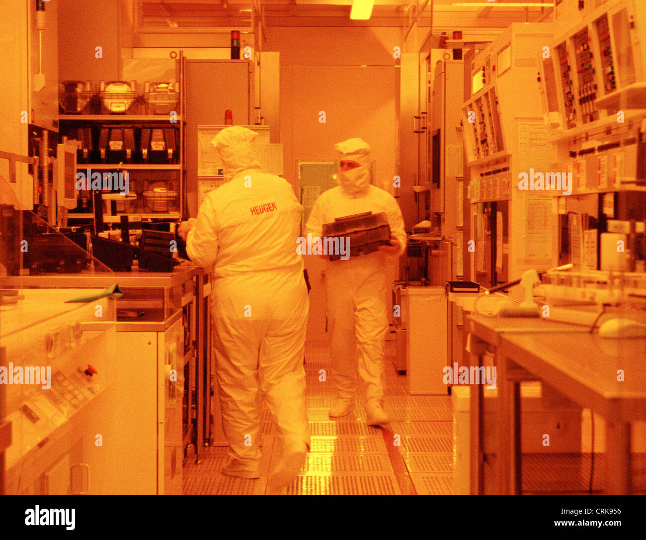 Employees in protective suit cleanroom at Infineon Stock Photo - Alamy