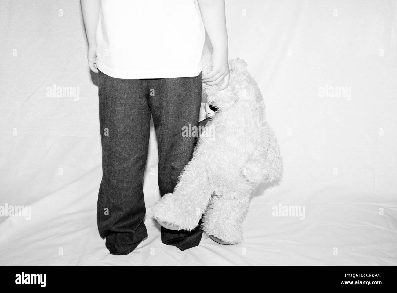 child holding teddy bear Stock Photo - Alamy